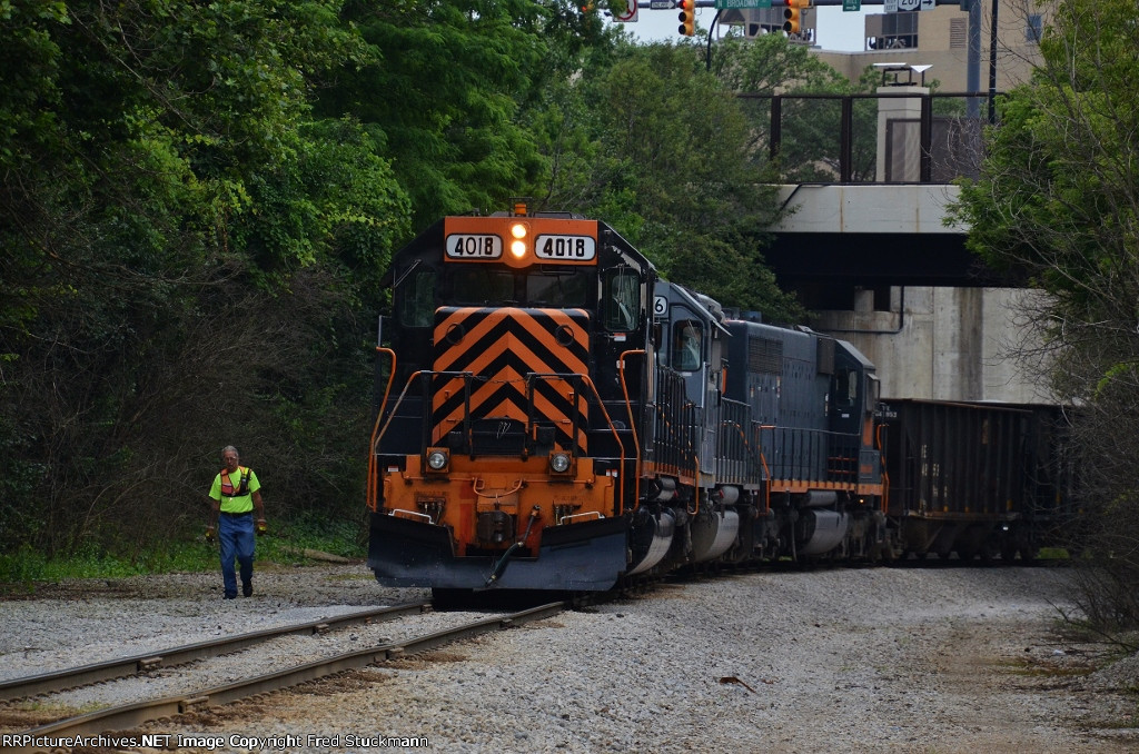 WE 4018 will pull the train into the siding and run around it.